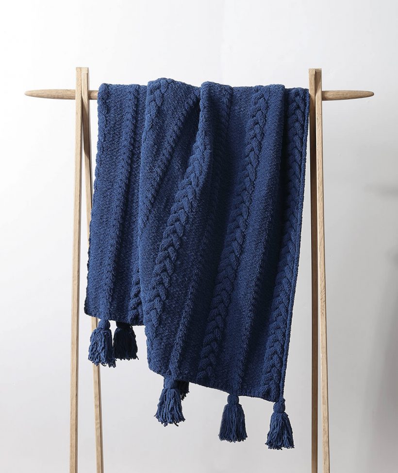 The 17 Cozy Chic Blankets that Add Texture and Warmth to Any Space