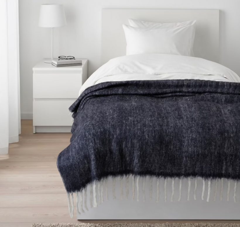 The 17 Cozy Chic Blankets that Add Texture and Warmth to Any Space