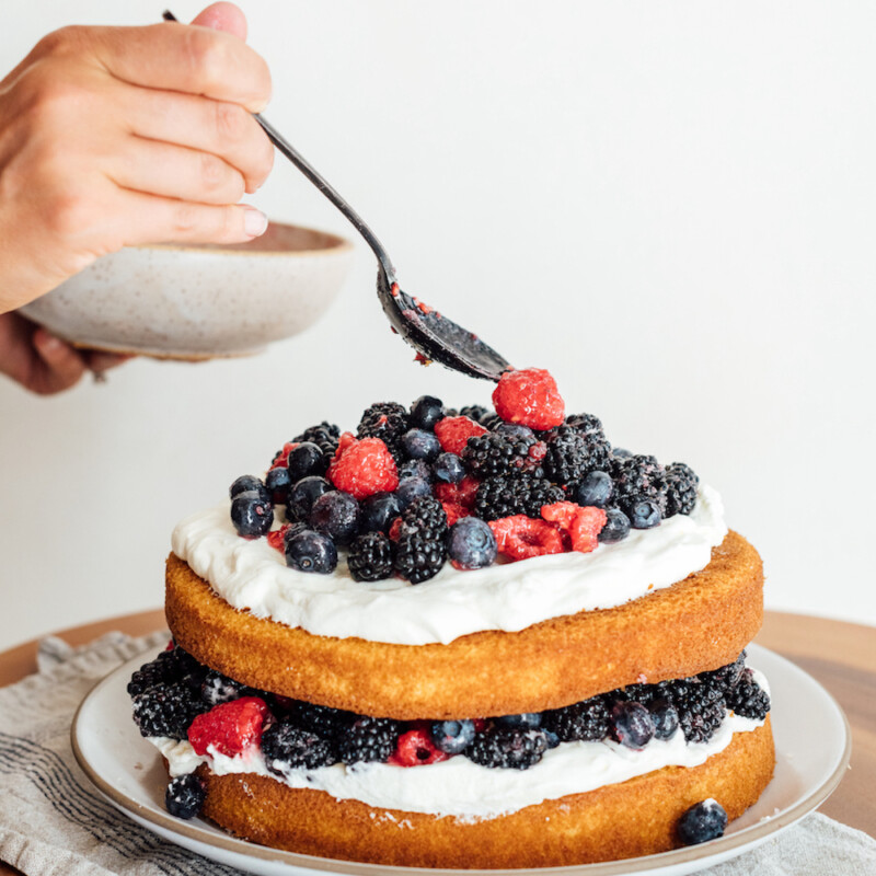 The Berries & Cream Layer Cake Recipe You'll Now Make For All Birthdays
